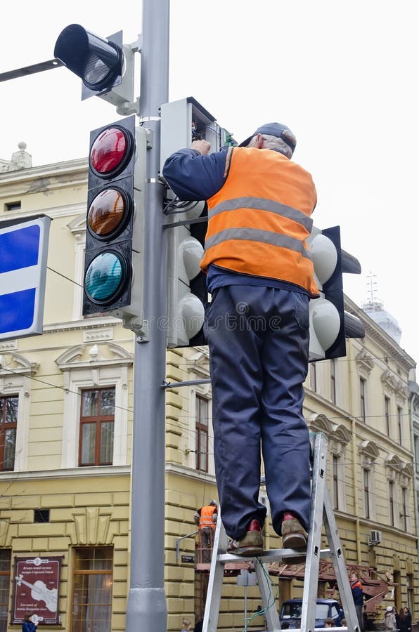 Worker Repairs the Traffic Light Editorial Photo - Image of lviv ...