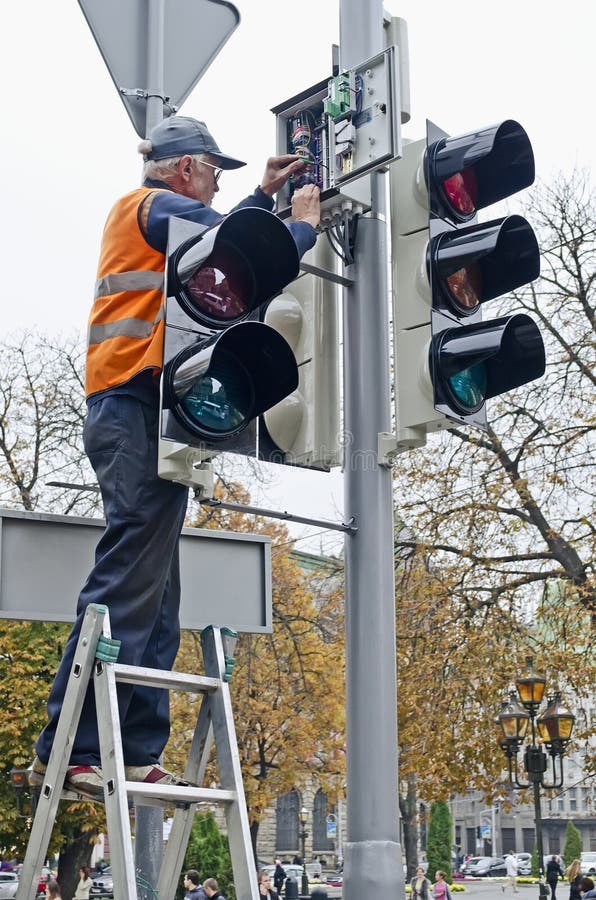 Worker Repairs the Traffic Light Editorial Photo - Image of lviv ...