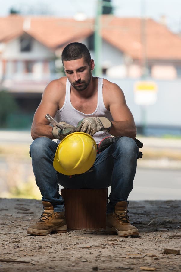 Worker is Resting Sitting on Brick Stock Photo - Image of repair ...