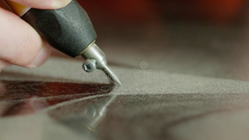 Worker`s Hand is Doing Sandblasting Writing on Dark Surface of Granite ...