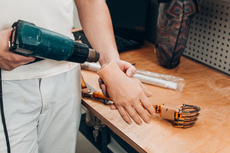 Worker S Hands Drying a Part of an Artificial Limb Glow with a Blow ...