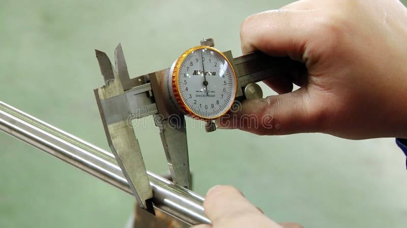 Worker S Hands Measure Thickness of Pipe with Caliper at the Factory ...