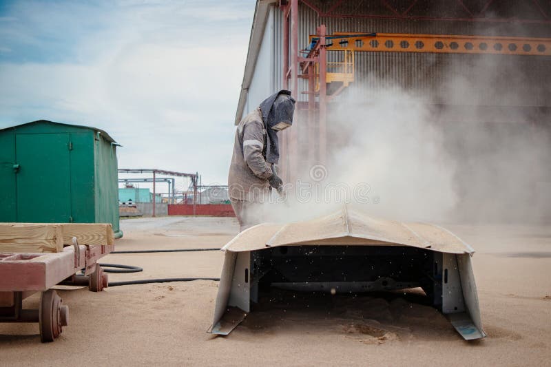 Worker Sandblasting a Metal Structure at an Industrial Plant To Remove ...