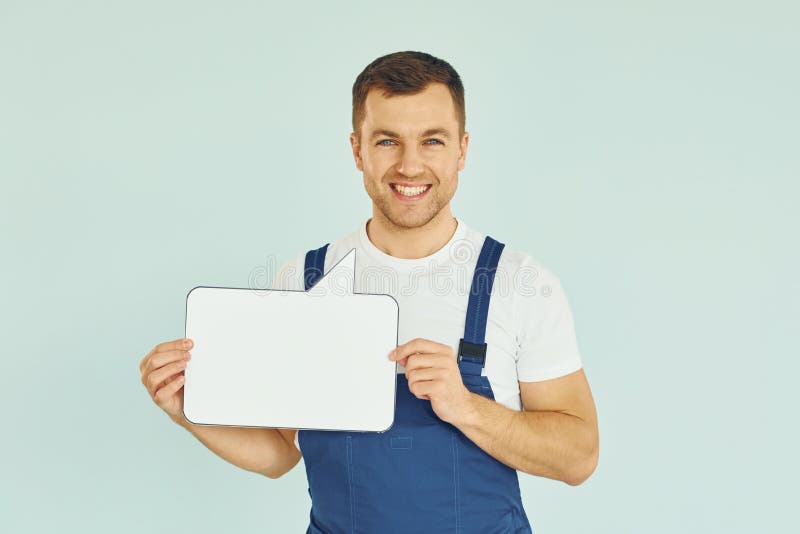 Worker Saying Something. Man Standing in the Studio with Empty Signs ...