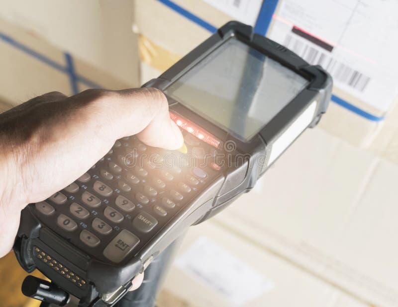 Worker Scanning Barcode Scanner on Package Boxes, Sorting Shipment ...