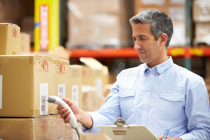 Worker Scanning Package in Warehouse Stock Photo - Image of person ...