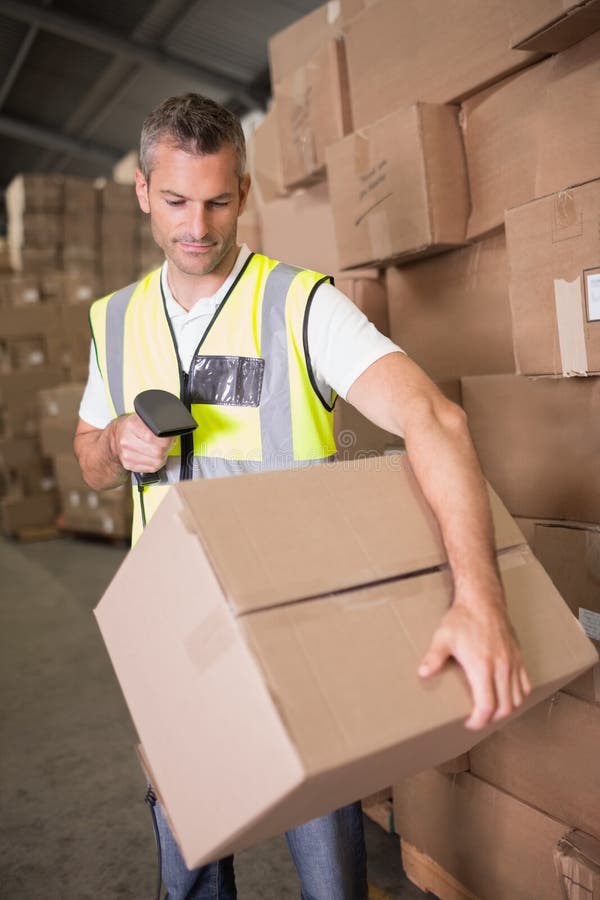 Worker Scanning Package in Warehouse Stock Image - Image of record ...