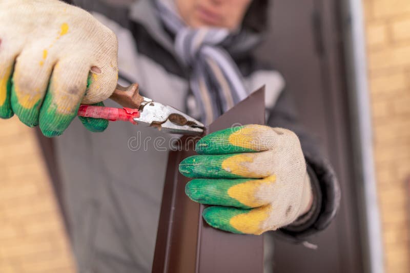 Worker Scissors Metal at a Construction Site Stock Photo - Image of ...