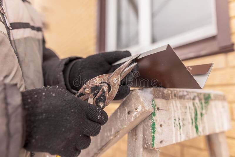 Worker Scissors Metal at a Construction Site Stock Photo - Image of ...