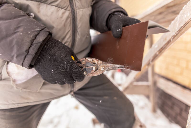 Worker Scissors Metal at a Construction Site Stock Image - Image of ...