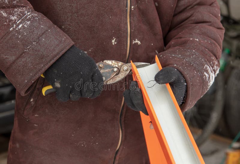 Worker Scissors Metal at a Construction Site Stock Image - Image of ...