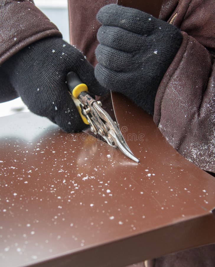 Worker Scissors Metal at a Construction Site Stock Image - Image of ...