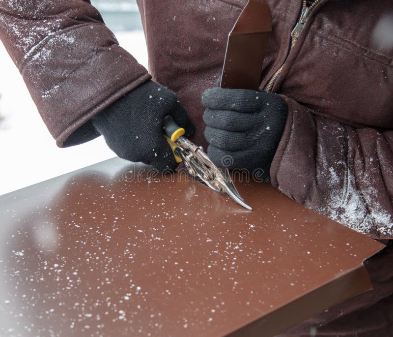 Worker Scissors Metal at a Construction Site Stock Photo - Image of ...