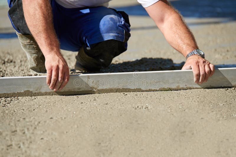 Worker Screeding Cement Floor with Screed Stock Photo - Image of ...