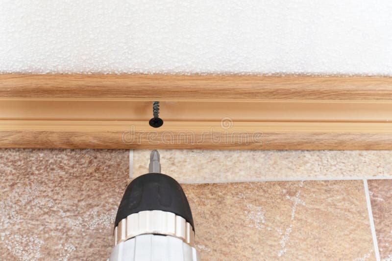 Installation of Plastic Floor Plinth. Interior Details Stock Image ...