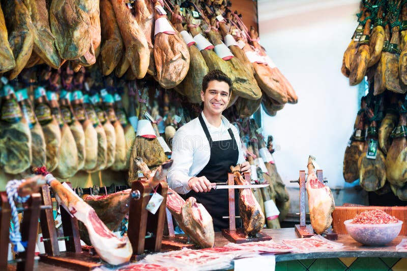 Worker Selling Spanish Jamon Stock Photo - Image of young, grocery ...