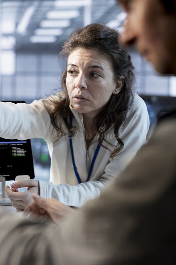 Worker in Server Farm Configuring and Testing Equipment Stock Photo ...