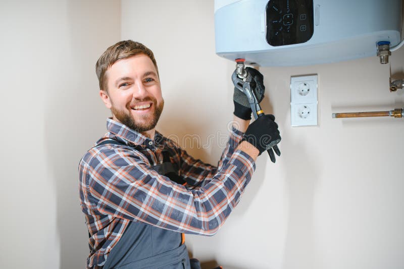 Worker Set Up Central Gas Heating Boiler at Home Stock Photo - Image of ...