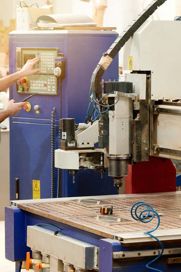 A Worker Sets Up an Automatic Milling Machine Stock Image - Image of ...