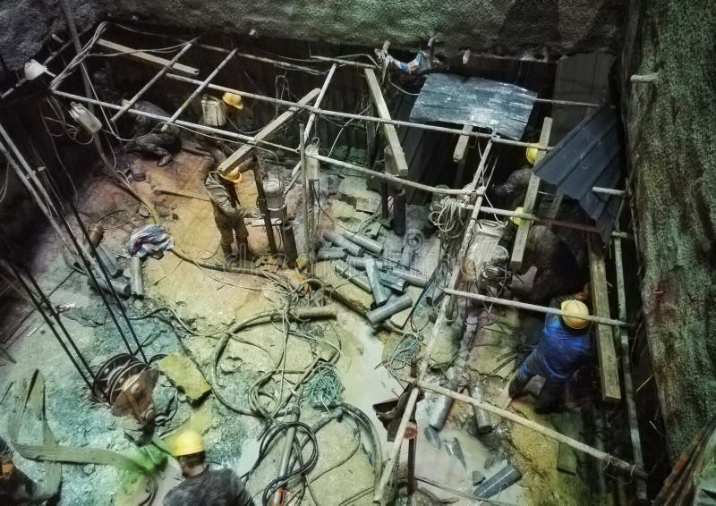 Worker in Shaft Construction Site Editorial Photo - Image of shafts ...