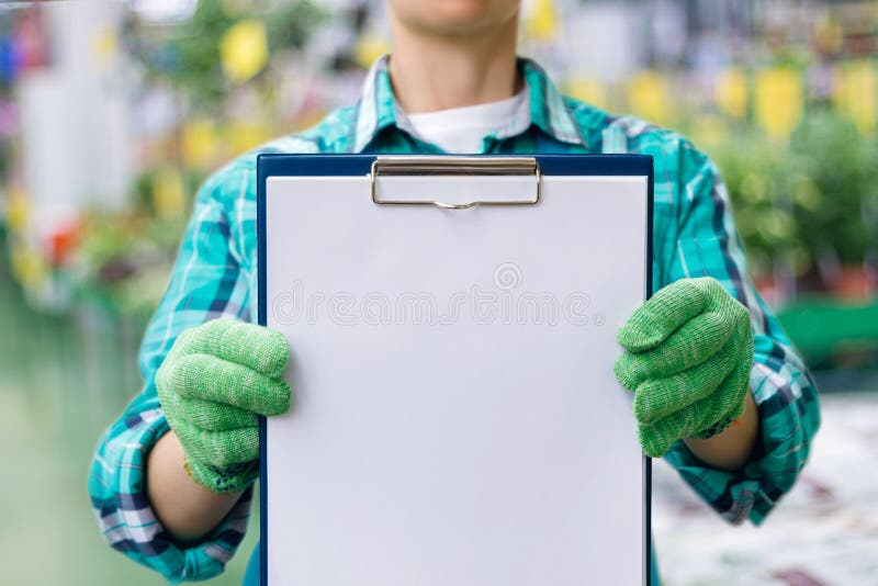 Worker shows check list . stock image. Image of inspector - 118269471