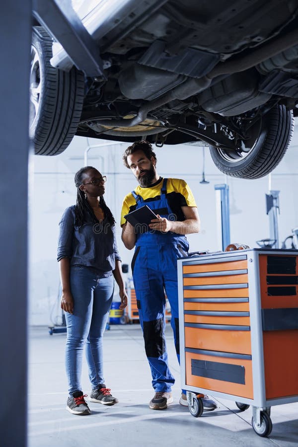 Worker Shows Client Car Checkup Steps Stock Image - Image of automotive ...