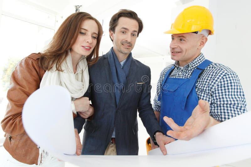 Worker Shows House Design Plans Stock Image - Image of helmet ...