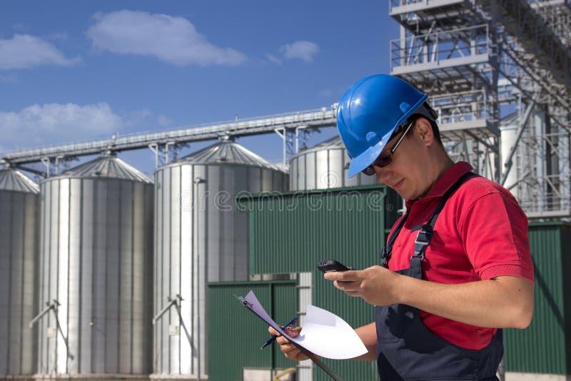 Worker in silo company stock photo. Image of silos, helmet - 31096890