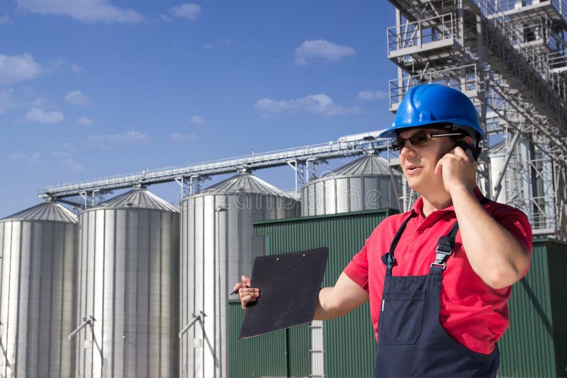 Worker in silo company stock image. Image of laptop, industrial - 31096613