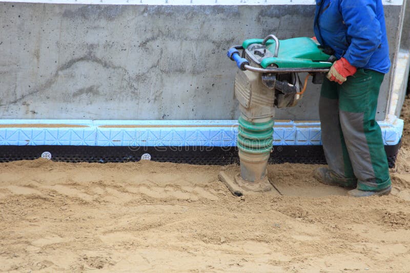Worker at Site Working with Compress Tool Stock Image - Image of ...