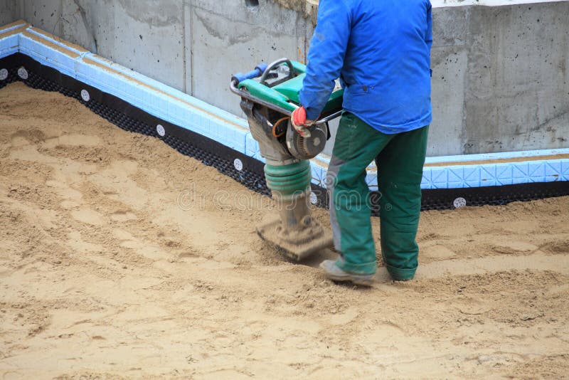 Worker at Site Working with Compress Tool Stock Image - Image of ...