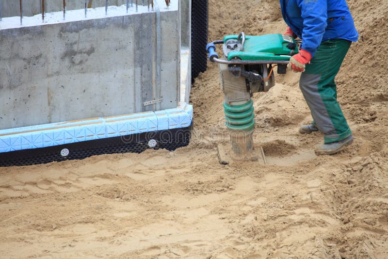 Worker at Site Working with Compress Tool Stock Image - Image of blue ...