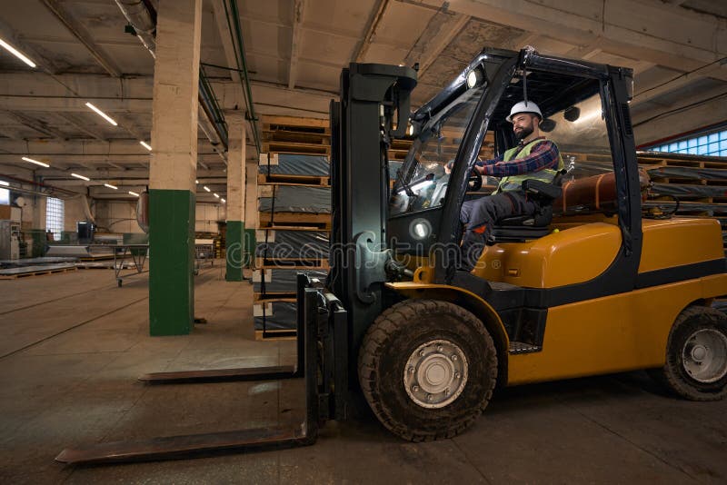 Worker Sitting in Car and Preparing To Load Materials Stock Photo ...