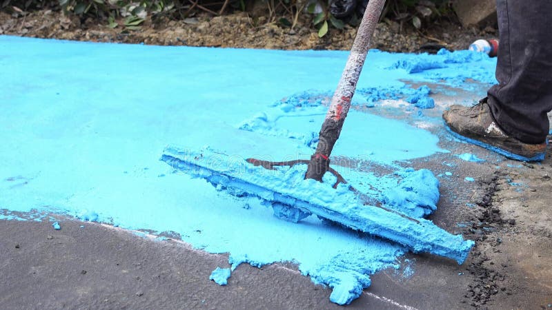 Applying a Bright Blue Coating on the Surface with a Rake Tool for an ...