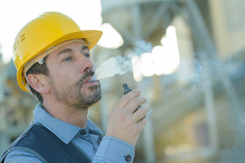 Worker Smoking Electronic Cigarette Stock Photo - Image of lunch, work ...