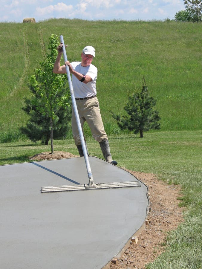 Worker smoothing concrete stock image. Image of grey, construction ...