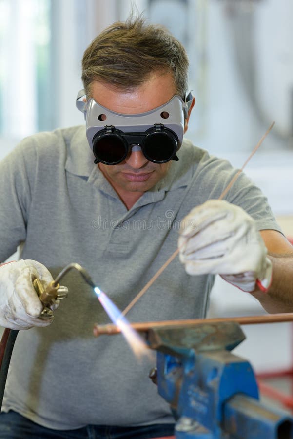 Worker Soldering Copper Pipe with Blowtorch Stock Image - Image of ...