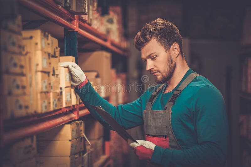 Worker in a Spare Parts Warehouse Stock Image - Image of shipment ...