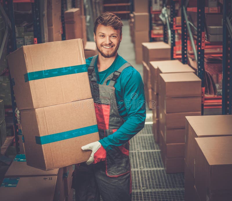 Porter carrying boxes stock photo. Image of freight, commercial - 61170596