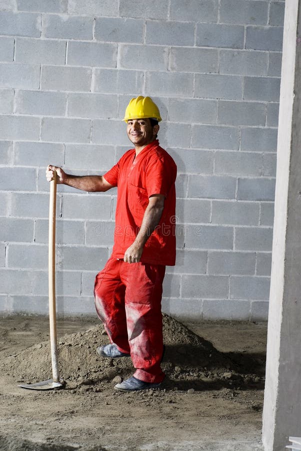 Worker Stands Next To Dirt Pile Stock Image - Image of upright ...