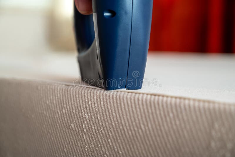 Worker Stapling Sofa Lining with Electric Staple Gun Stock Image ...