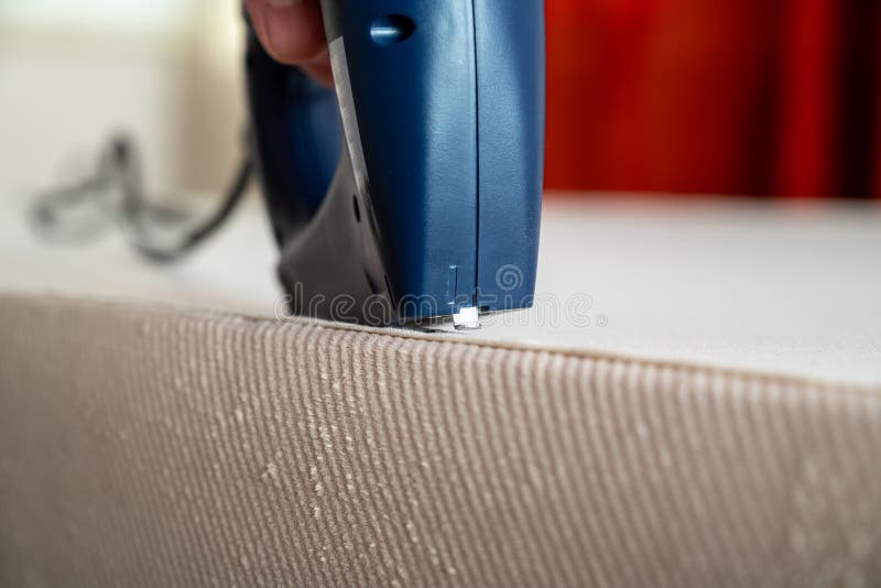 Worker Stapling Sofa Lining with Electric Staple Gun Stock Image ...