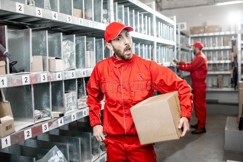 Worker Stealing Some Product in the Warehouse Stock Image - Image of ...