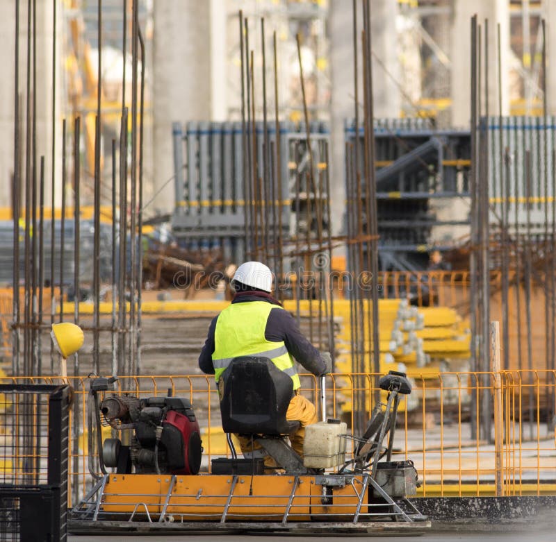 Worker with Steel Trowel Machine for Smoothing Surface To Finish Stock ...