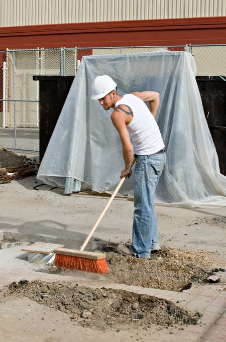 Worker Sweeping Dirt stock photo. Image of dust, industrial - 7418624