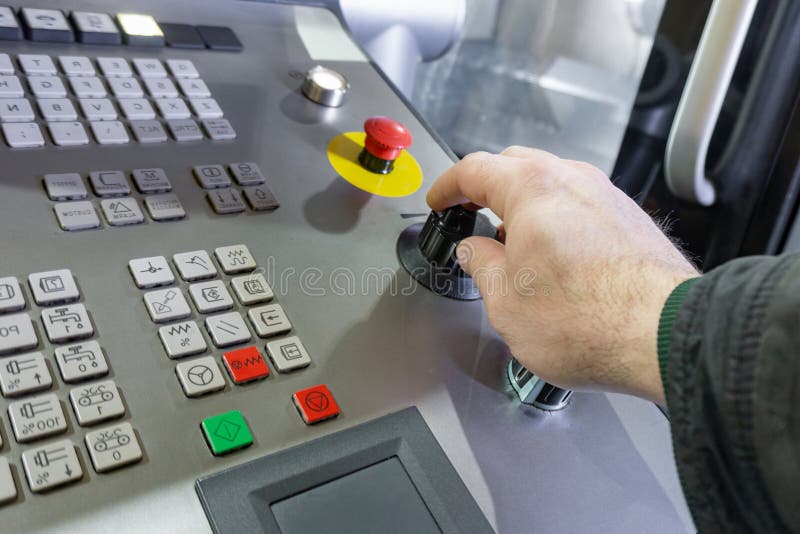 The Worker Switches the Buttons on the Remote Control of the CNC ...
