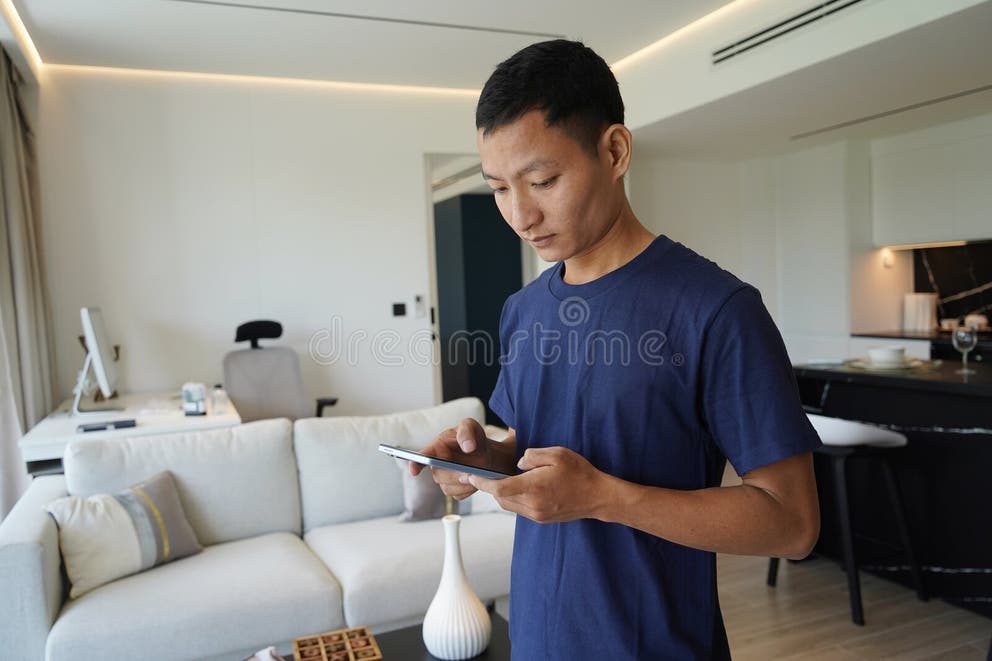 Worker with Tablet Computer Checking Alarm System Stock Photo - Image ...
