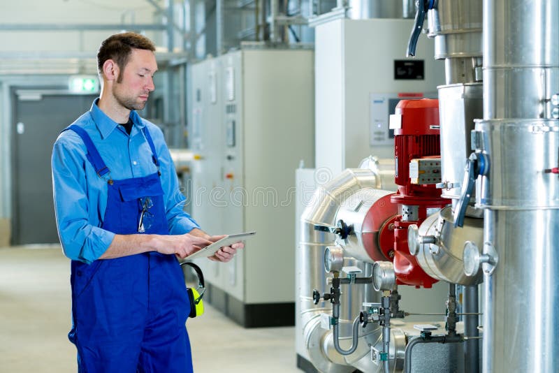 Worker with Tablet Computer in Industrial Plant Stock Image - Image of ...