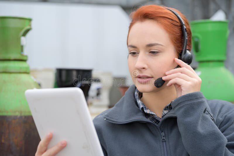 Worker with Tablet and Headset Stock Image - Image of headphones ...