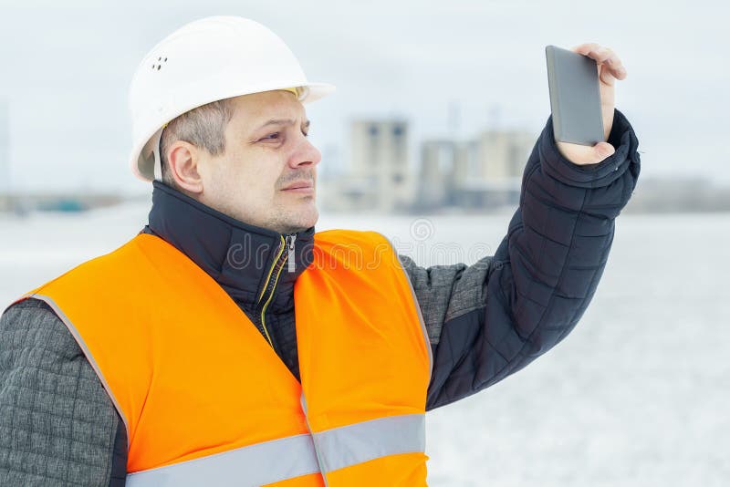 Worker with Tablet PC on the Field in Winter Stock Photo - Image of ...